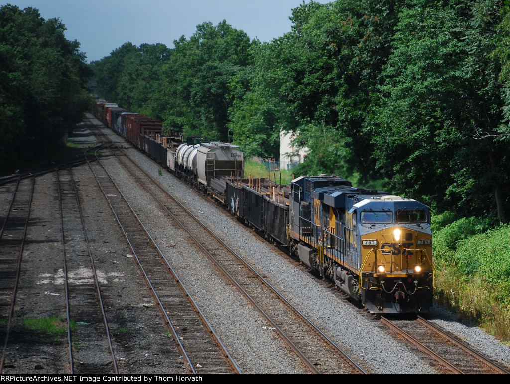 CSX 417 makes its way east through an empty Manville yard